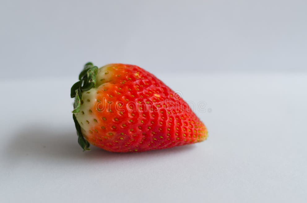 One strawberry side view stock photo. Image of beautiful - 69990368