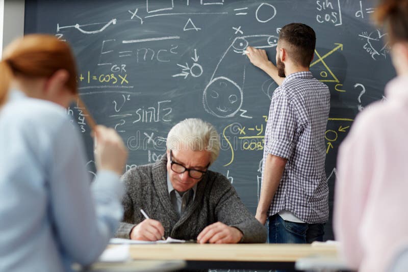 Student by blackboard stock image. Image of formula - 114428293