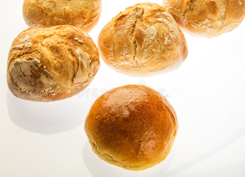 One Sweet Bread and Four Small Normal Bread Stock Photo - Image of ...