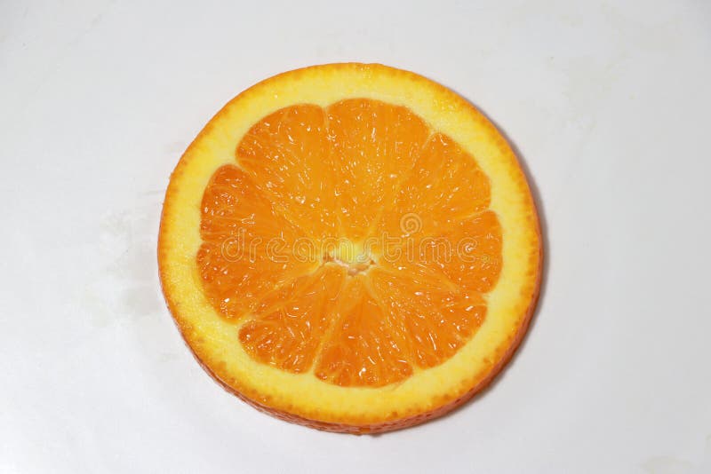One Thin Round Pieces of Orange Slice on White Plate Stock Image ...