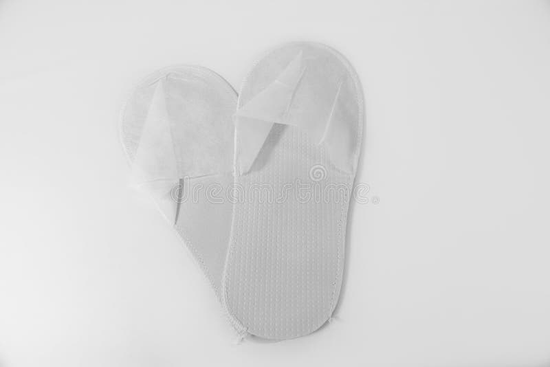 One Time Use Hotel Slippers on a White Stock Photo - Image of cozy ...