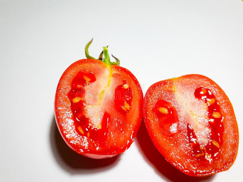 Tomato Split in Half, the Seeds are Seen Stock Image - Image of halved ...