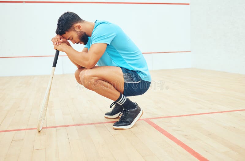One Unknown Athletic Squash Player Crouching and Feeling Sad and ...