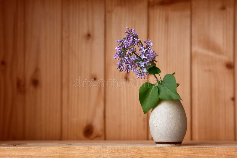 One Vase with Flowers at Wooden Background Stock Photo - Image of lilac ...