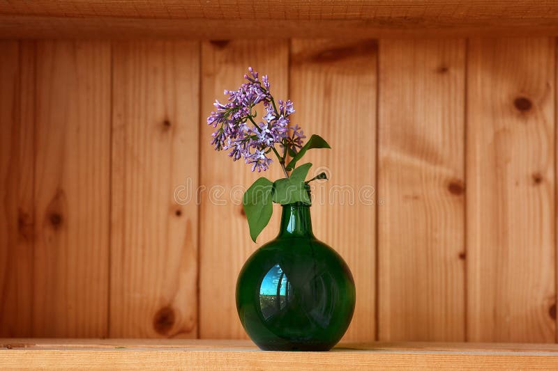 One Vase with Flowers at Wooden Background Stock Image - Image of ...