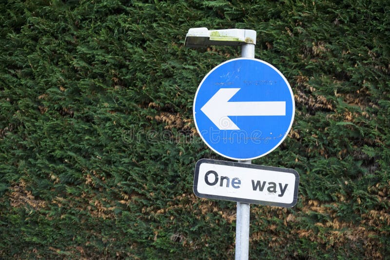 One Way Directional Arrow Sign Against Blue Sky Stock Photo - Image of ...