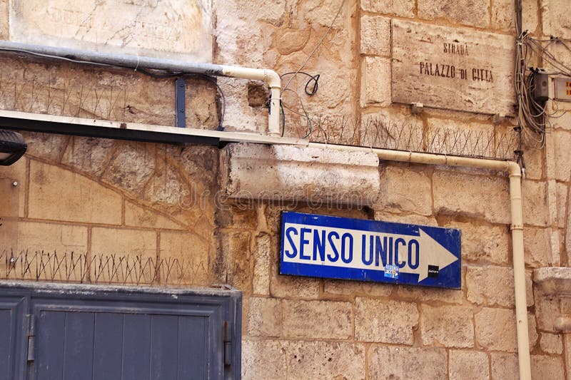 One Way Road Sign, Building Wall with Sign, One Direction Stock Photo ...
