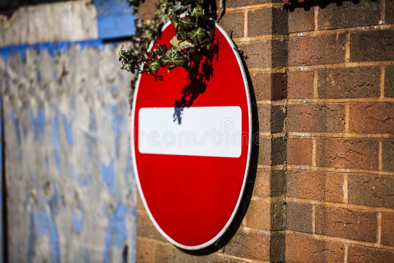 One Way Round Sign on the Wall. Traffic Signs on the Wall. Concept of ...