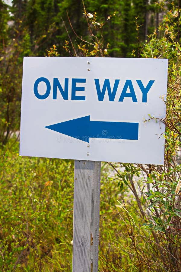 A One Way Sign with an Direction Arrow Stock Photo - Image of road ...