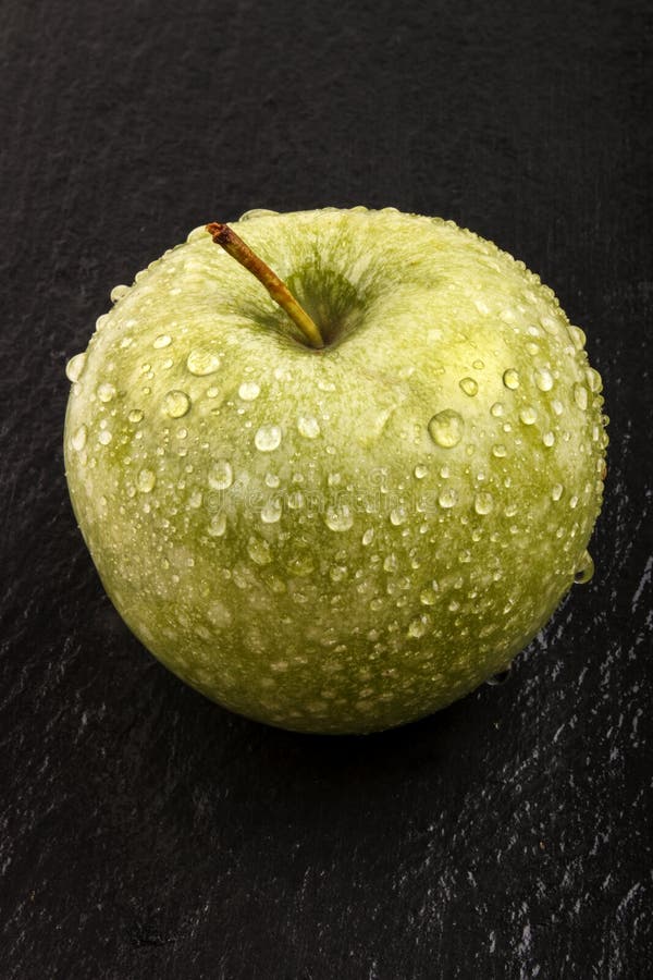 One wet apple on slate stock photo. Image of slate, antioxidant - 78155284