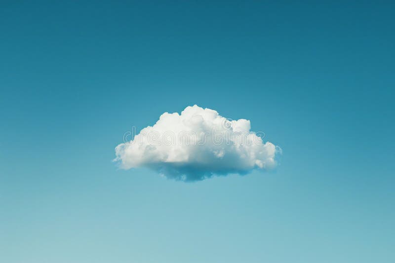 One White Cloud Floating in the Sky Against a Solid Blue Background in ...