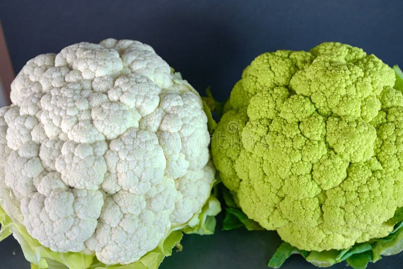One White and One Green Cauliflower Stock Photo - Image of organic ...