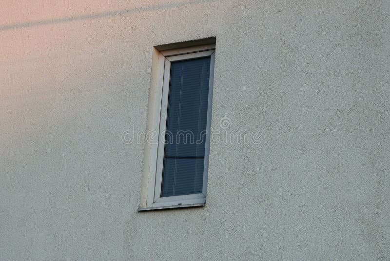One White Long Window on the Gray Concrete Wall Stock Photo - Image of ...