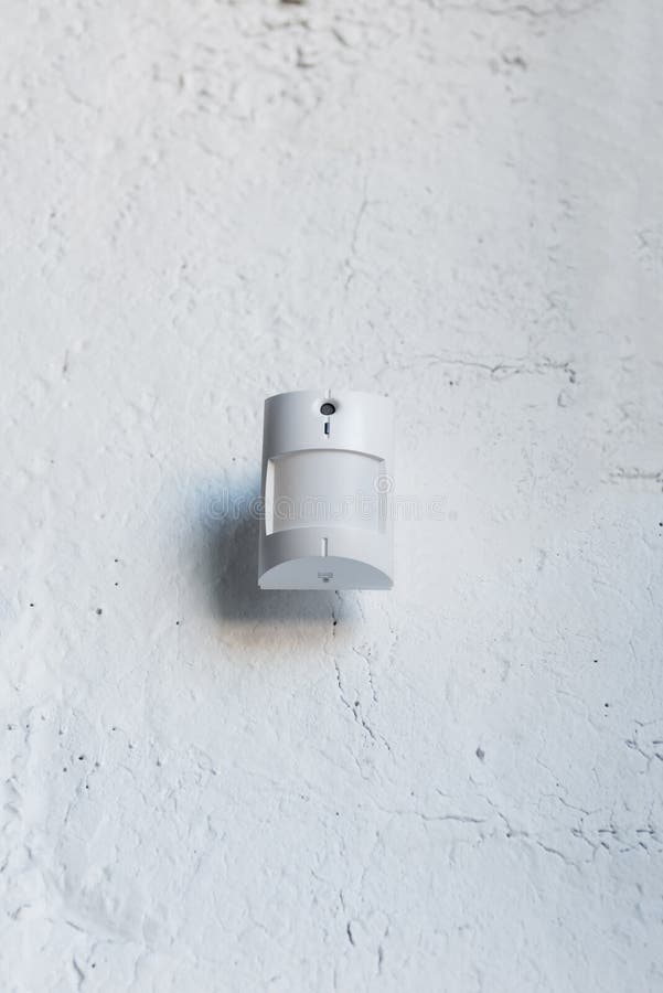 One White Motion Sensor on White Wall Stock Photo - Image of safety ...
