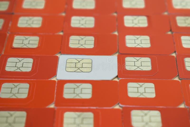 One White SIM Card is among Many Red Ones. Technological Background ...