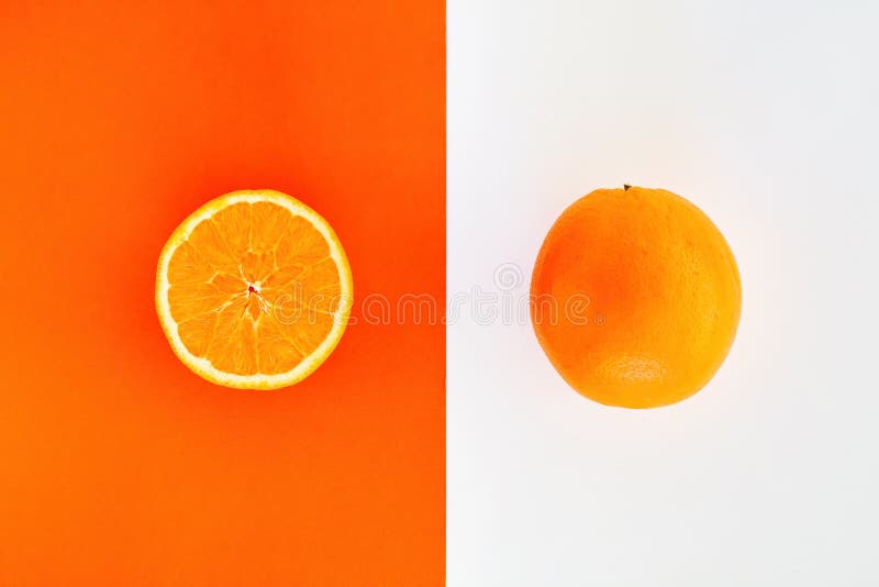 One Whole and One Halved Slice of Orange Comparison Stock Image - Image ...