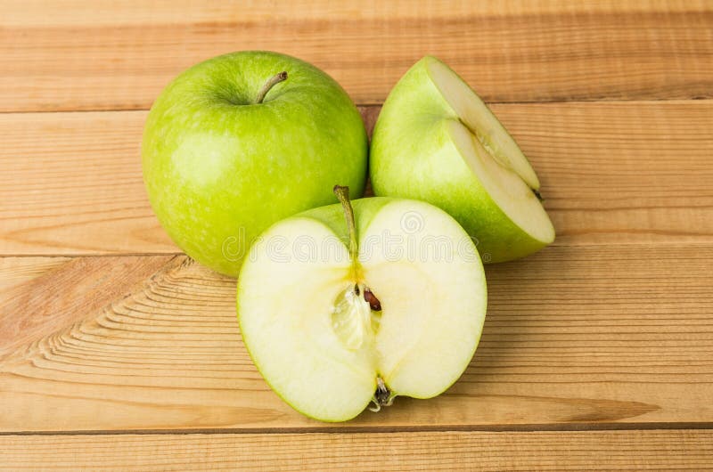One Whole and Sliced Apple on Table Stock Photo - Image of fresh ...