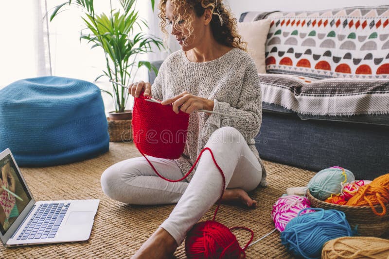 One Woman at Home in Relax Leisure Activity Doing Knit Work with Red ...