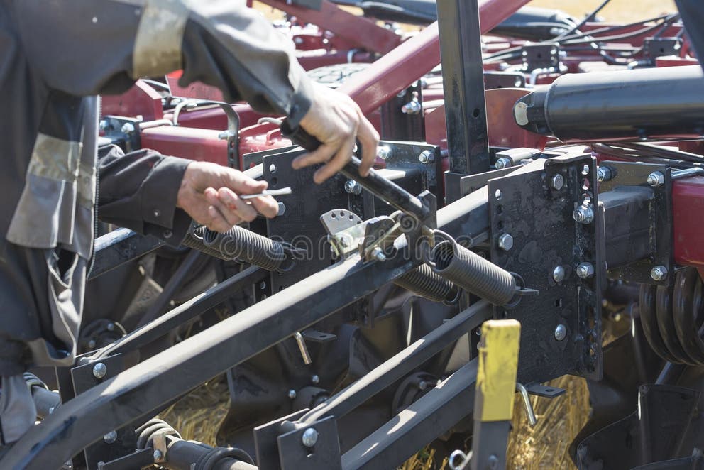 One Worker with Adjustable Wrench Repairing One Engine Stock Photo ...