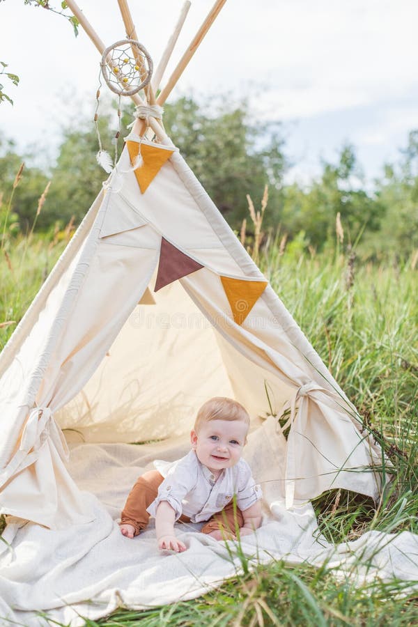 One Year Cute Boy in a Teepee Outdoors. Stock Photo - Image of ...