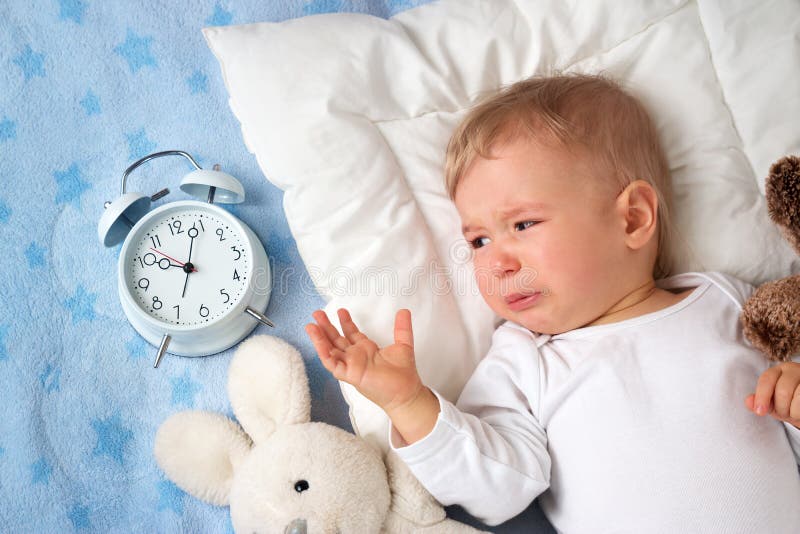 One Year Old Baby with Alarm Clock Stock Image - Image of cute, child ...