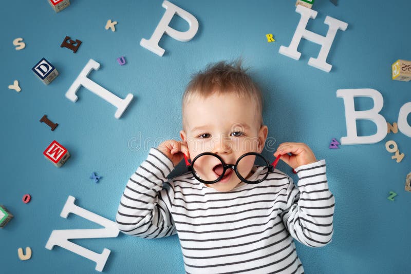 One Year Old Child Lying Spectacles Letters Stock Photos - Free ...