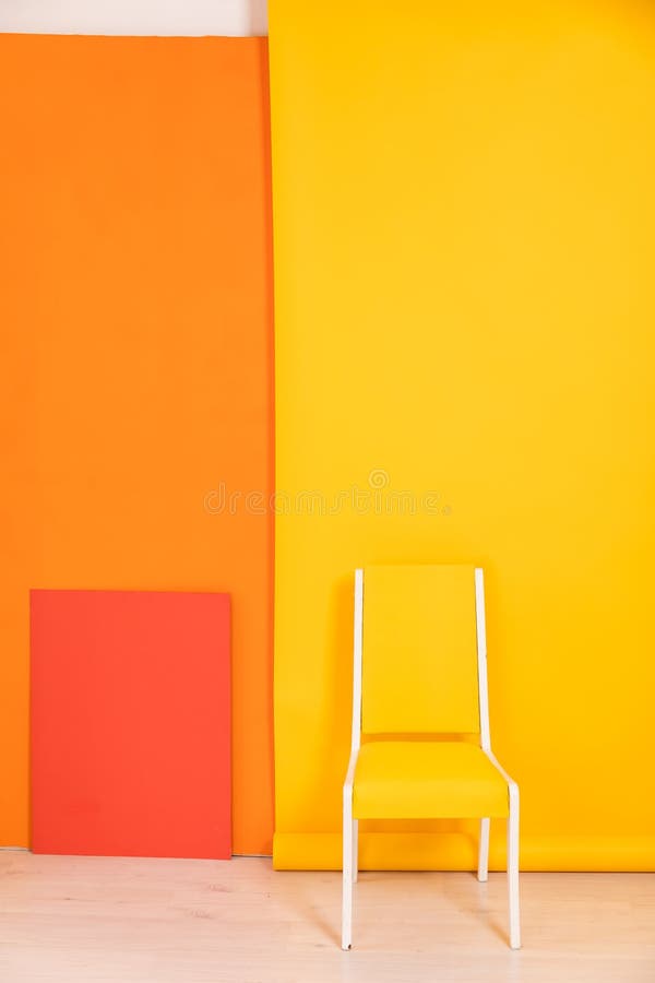 One Yellow Chair in Orange Wall Interior Stock Image - Image of ...
