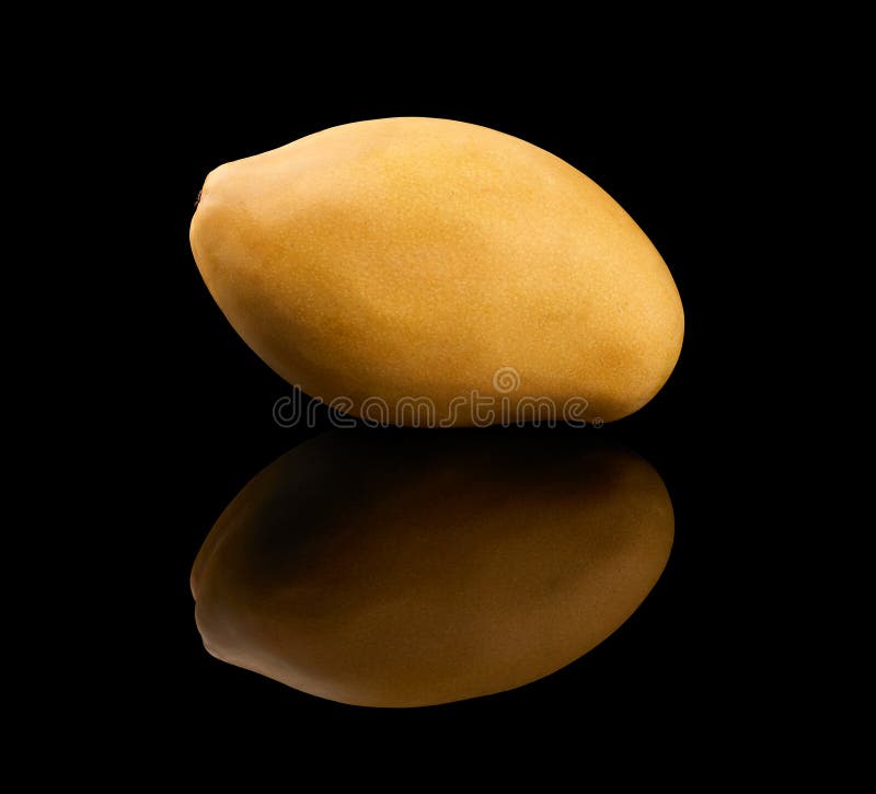 One mango on black stock photo. Image of eating, healthy - 119764114