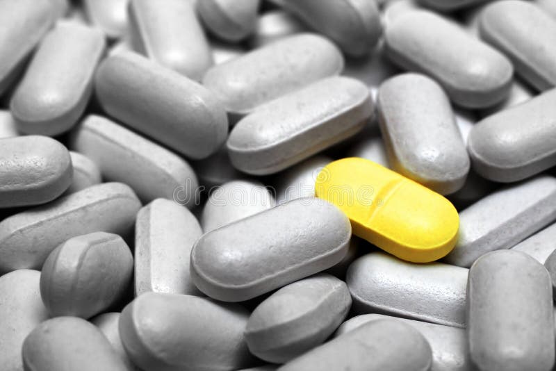 Yellow pill stock image. Image of painkillers, white - 19102793