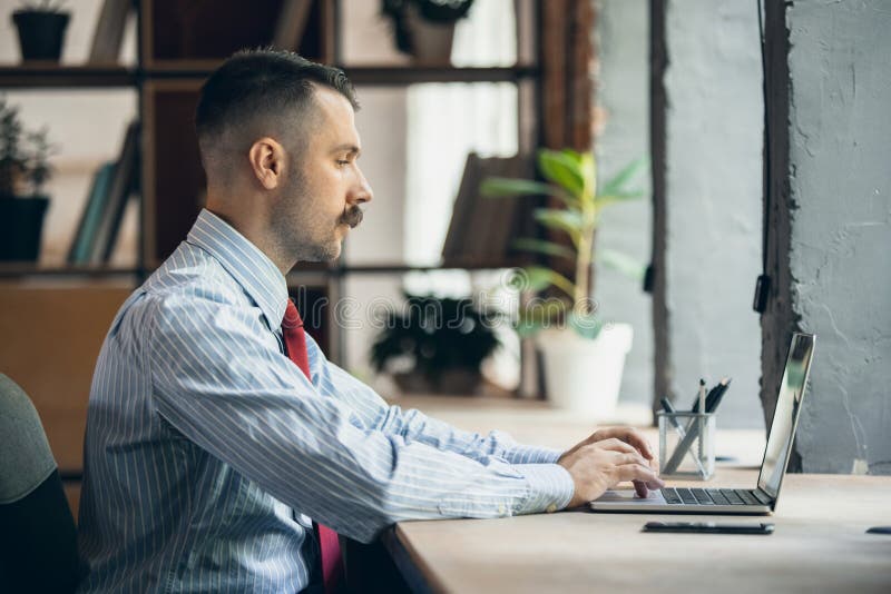 One Young Businessman, Office Worker, Manager Working on Laptop ...