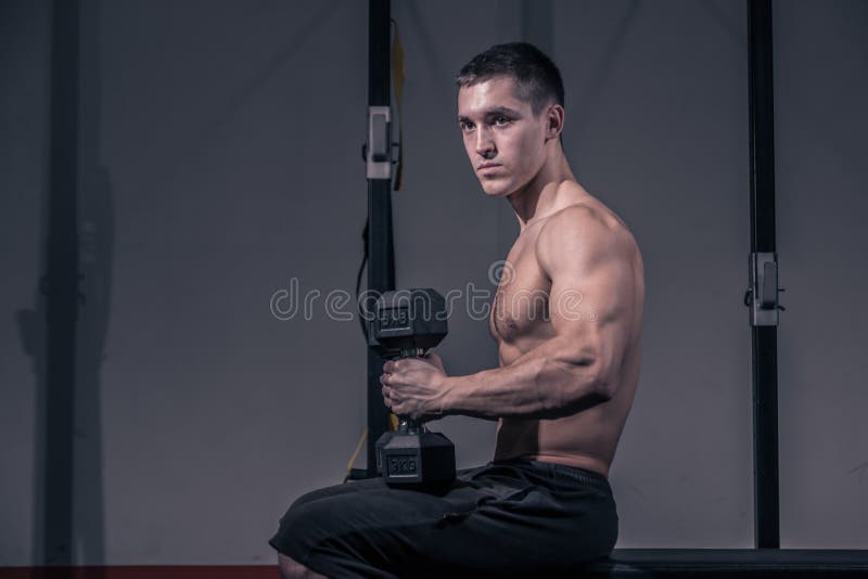 One Young Man, Bodybuilder Sitting, Flat Bench, Dumbbell Stock Image ...