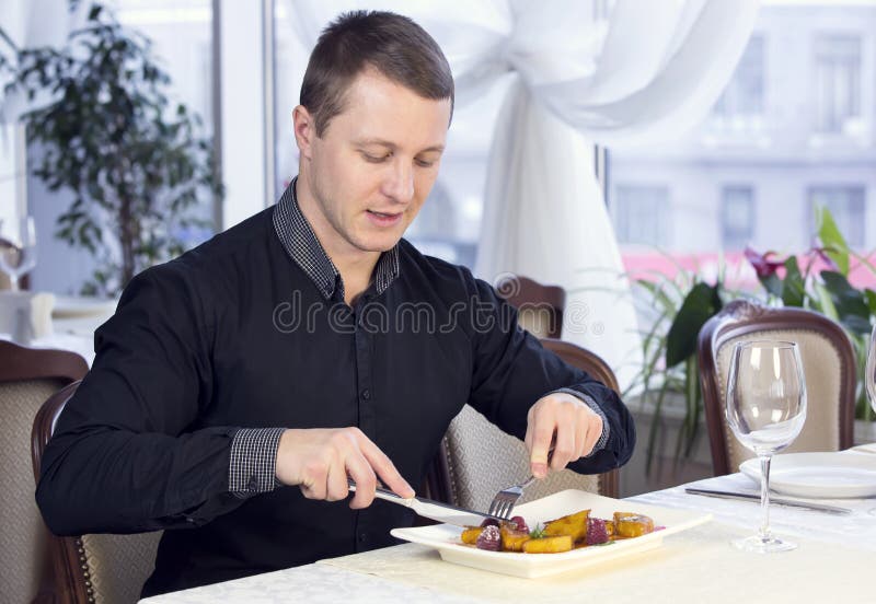 One young man dines stock photo. Image of beautiful, young - 43207780