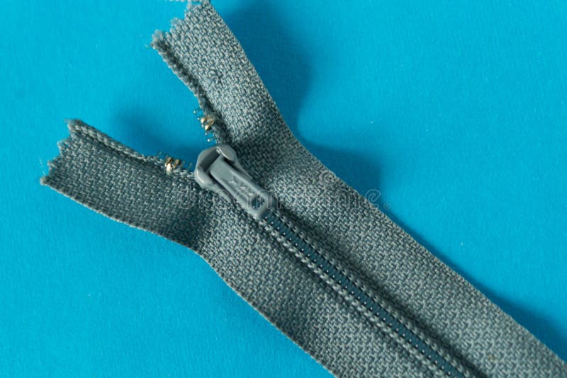 One Zipper on Blue Background Stock Image - Image of material, textured ...