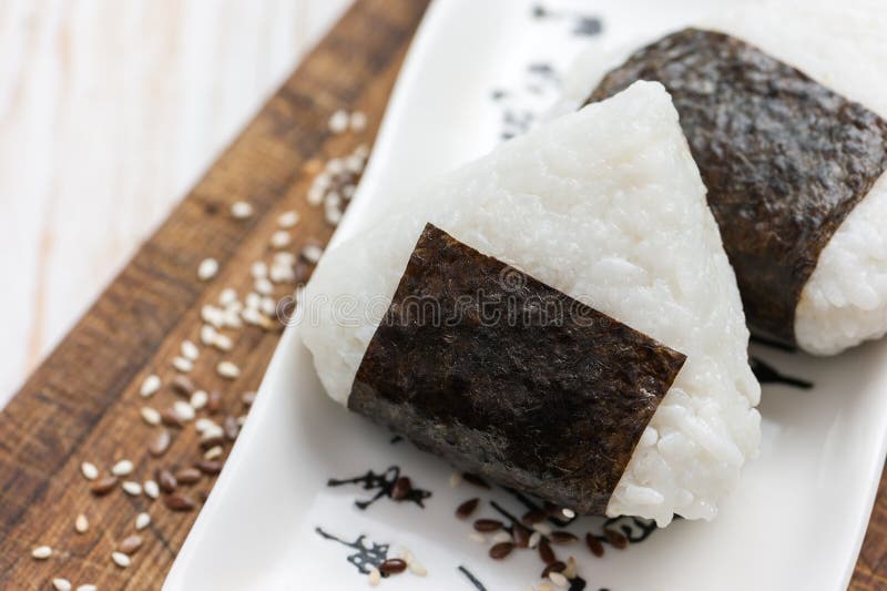 Onigiri. Rice Triangle With Nori Seaweed Stock Image - Image of food ...