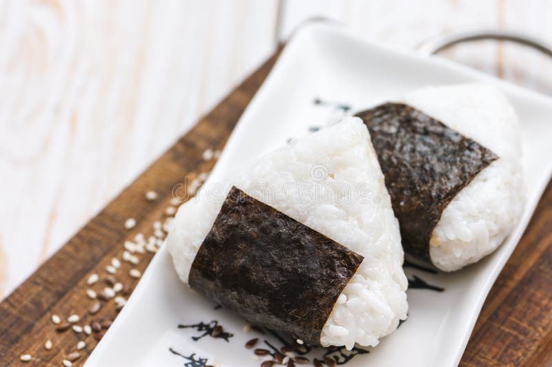 Onigiri Triangle Sushi Ball with Rice Wrapped Nori Seaweed Isolated on ...