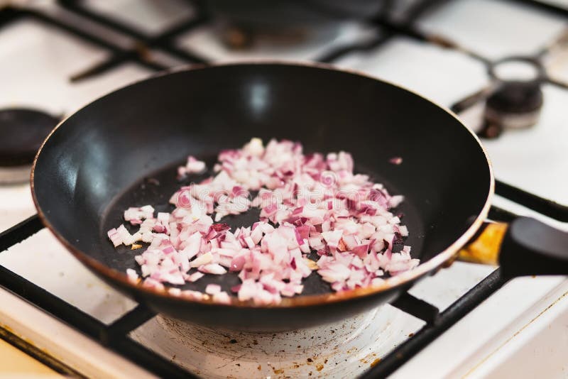Sauteing Diced Red Onion. stock image. Image of cooking - 13619699