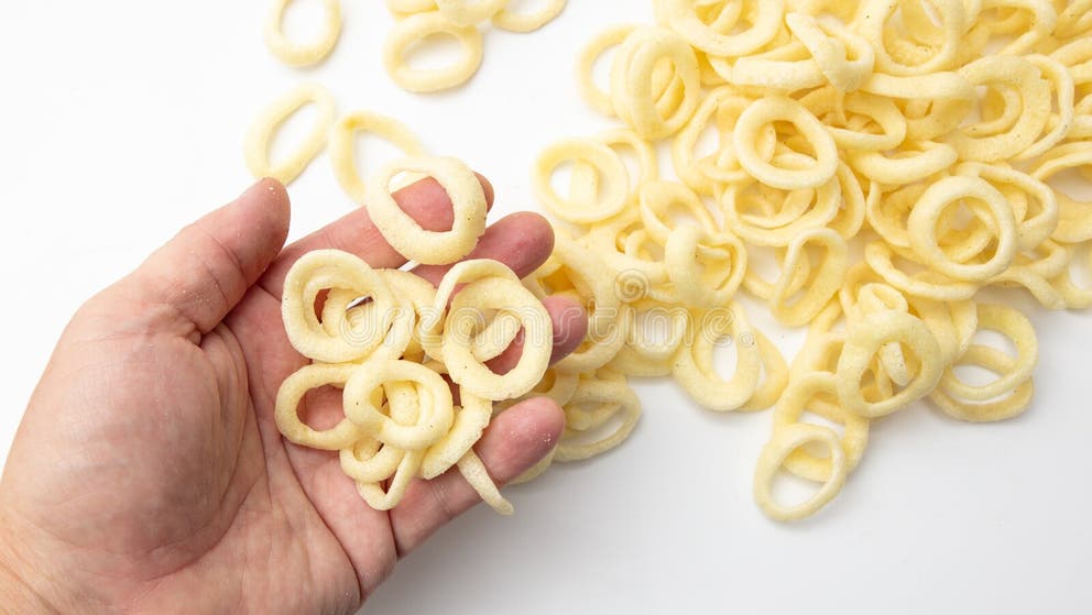Onion ring chips in hand. stock image. Image of chips - 271668899