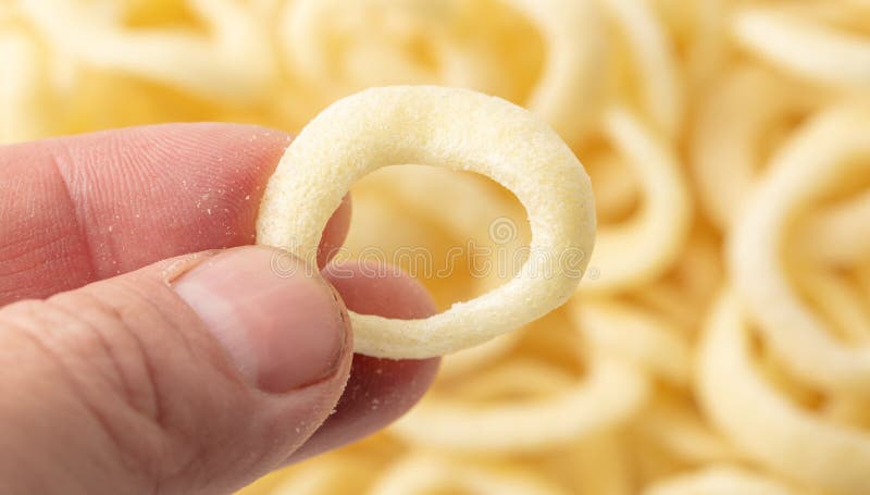 Onion ring chips in hand. stock photo. Image of rings - 271931836