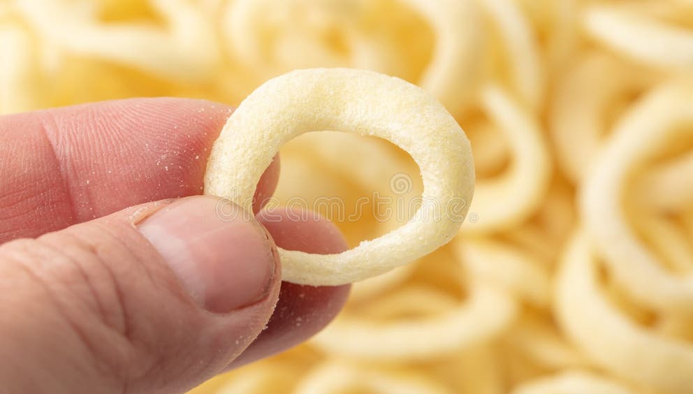Onion ring chips in hand. stock photo. Image of rings - 271931836