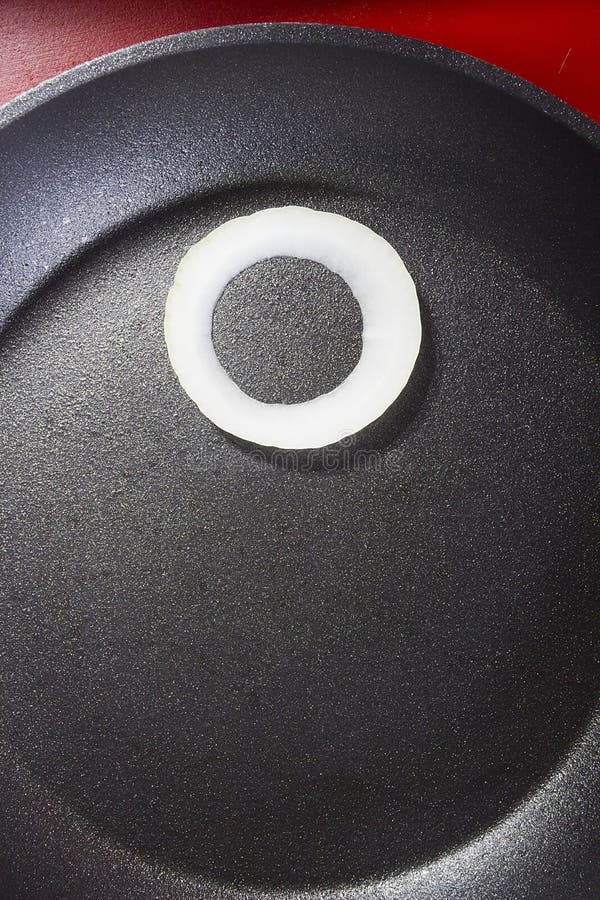 Pan onion ring stock photo. Image of sliced, black, white - 159983458
