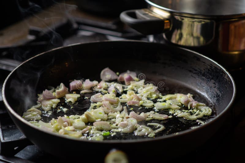 Onions are Fried in a Pan. Preparation for Cooking Stock Photo - Image ...