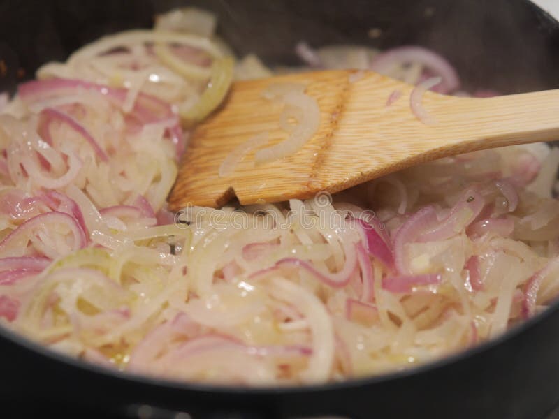 Onions in a pan stock image. Image of frying, cooking - 45597353