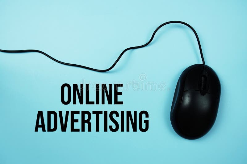 Online Advertising Text with Optical Mouse on Blue Background Stock ...