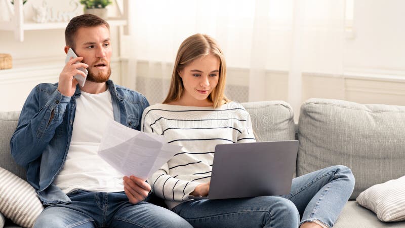 Married Partners Working from Home, Communicating with Clients by Phone ...