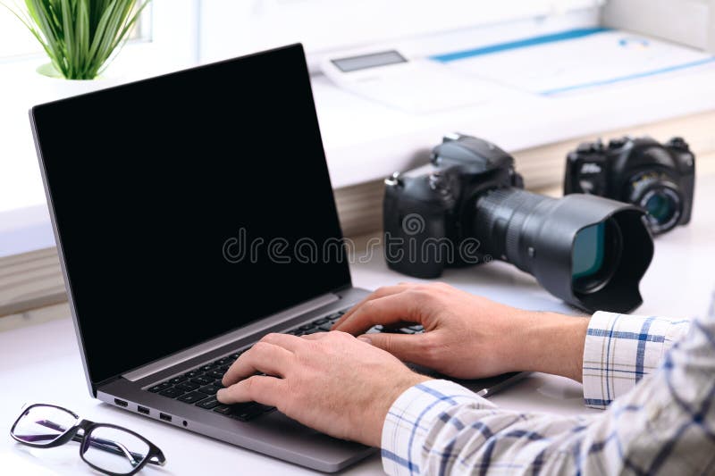 . Online Classes of Shooting with a Camera. on the Table are a Computer ...