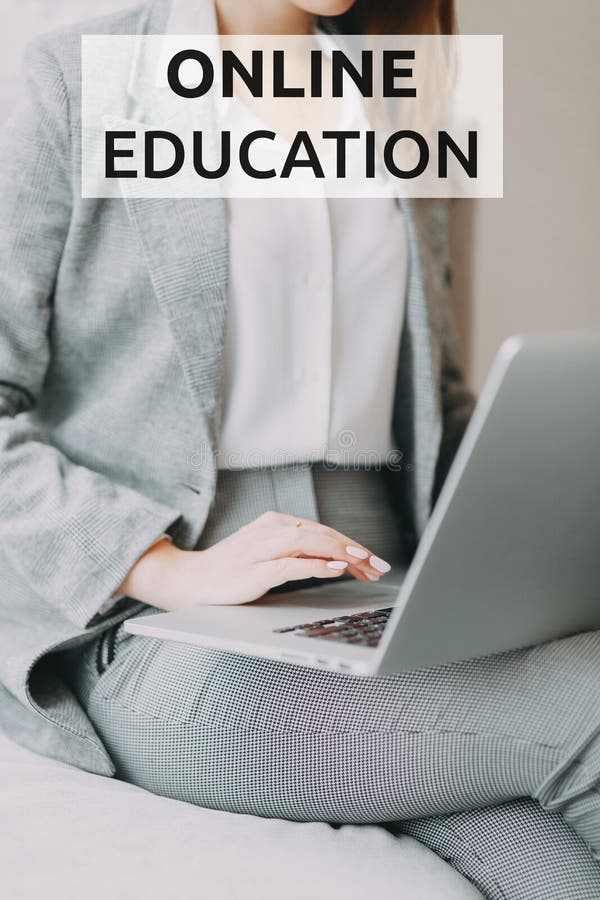 Online Education on the Internet. Hands at Work on a Laptop with Bokeh ...