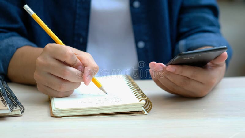Online Education Learning, Work from Home, Man Hand Writing on Notebook ...