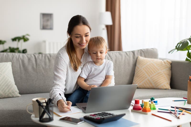 Online Education. Young Mother Holding Baby and Studying with Laptop ...