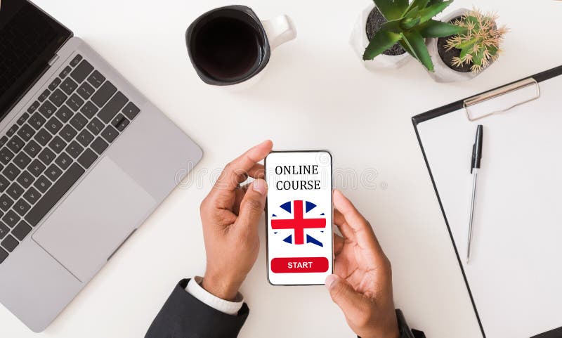 Online English Course. Young Man Holding Mobile Phone with Foreign ...