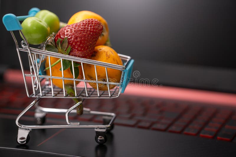 Online Food and Fruit Shopping from Home with Computer Stock Photo ...